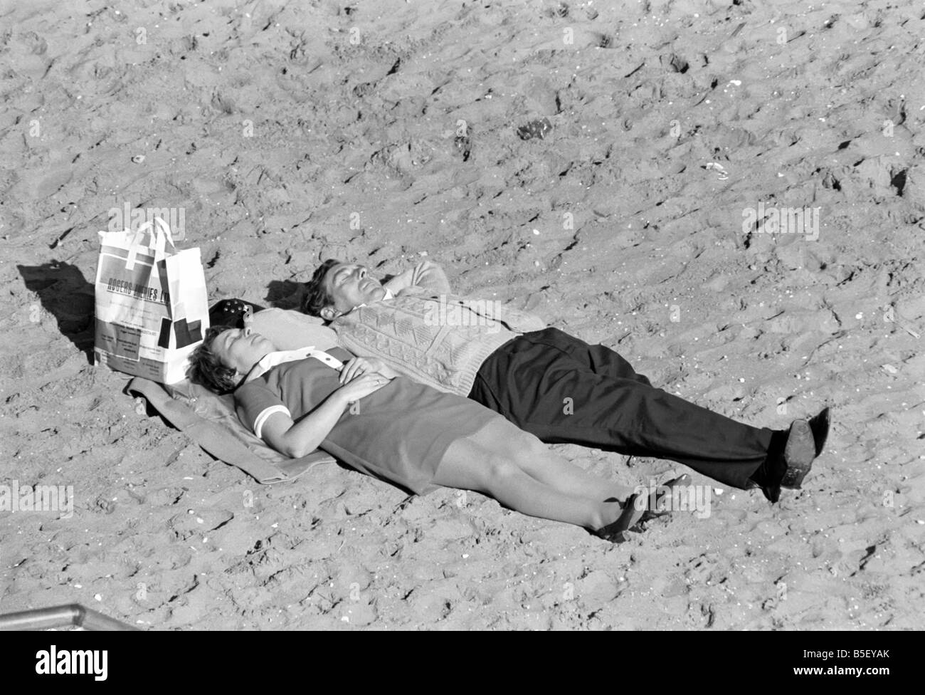 1970s couple beach hi-res stock photography and images - Alamy
