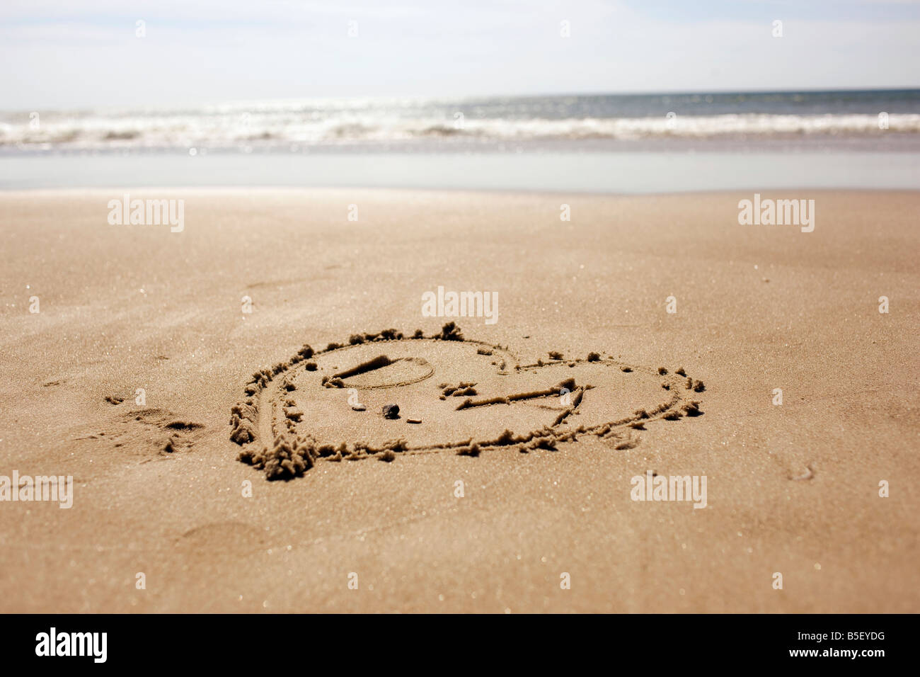 Germany, Baltic sea, Heart drawn in sand on beach Stock Photo - Alamy