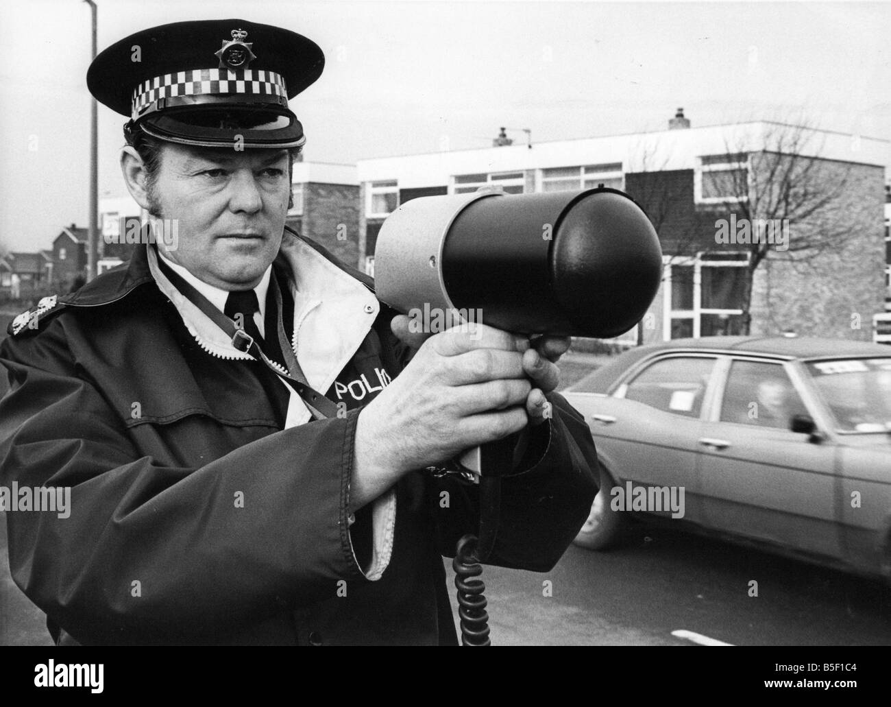 A police officer with the latest technology a radar gun in North ...