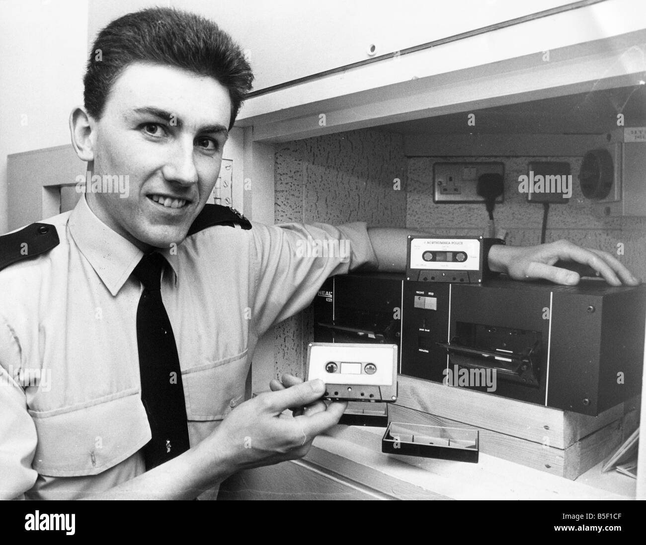 Police Officer Stephen Fleming with one of the interview room tape ...