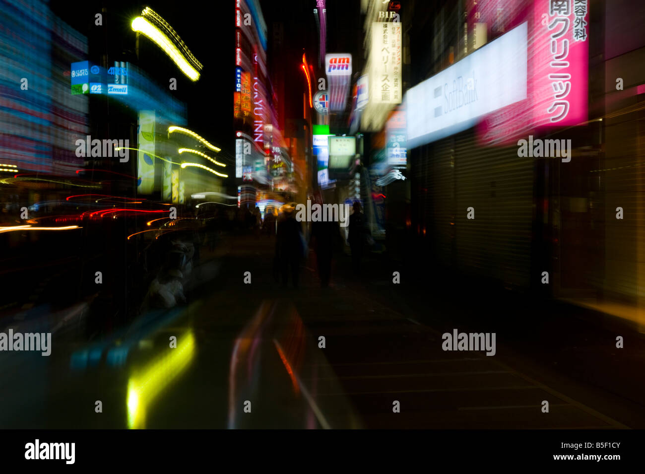 Zoom burst effect of neon signs in the streets of Shibuya, Tokyo, Japan ...
