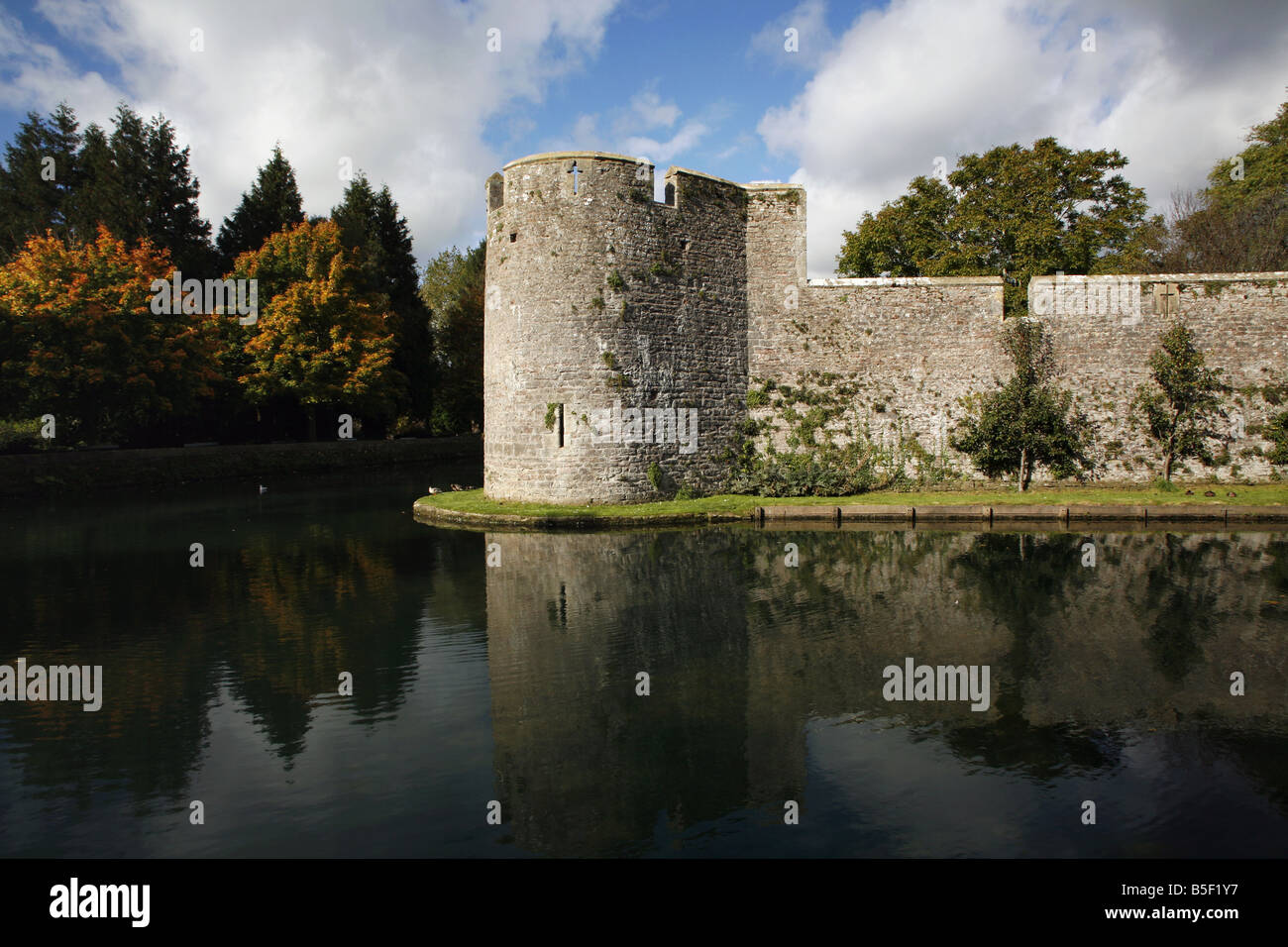 The walls and moat that surround the Bishops Palace in the small ...