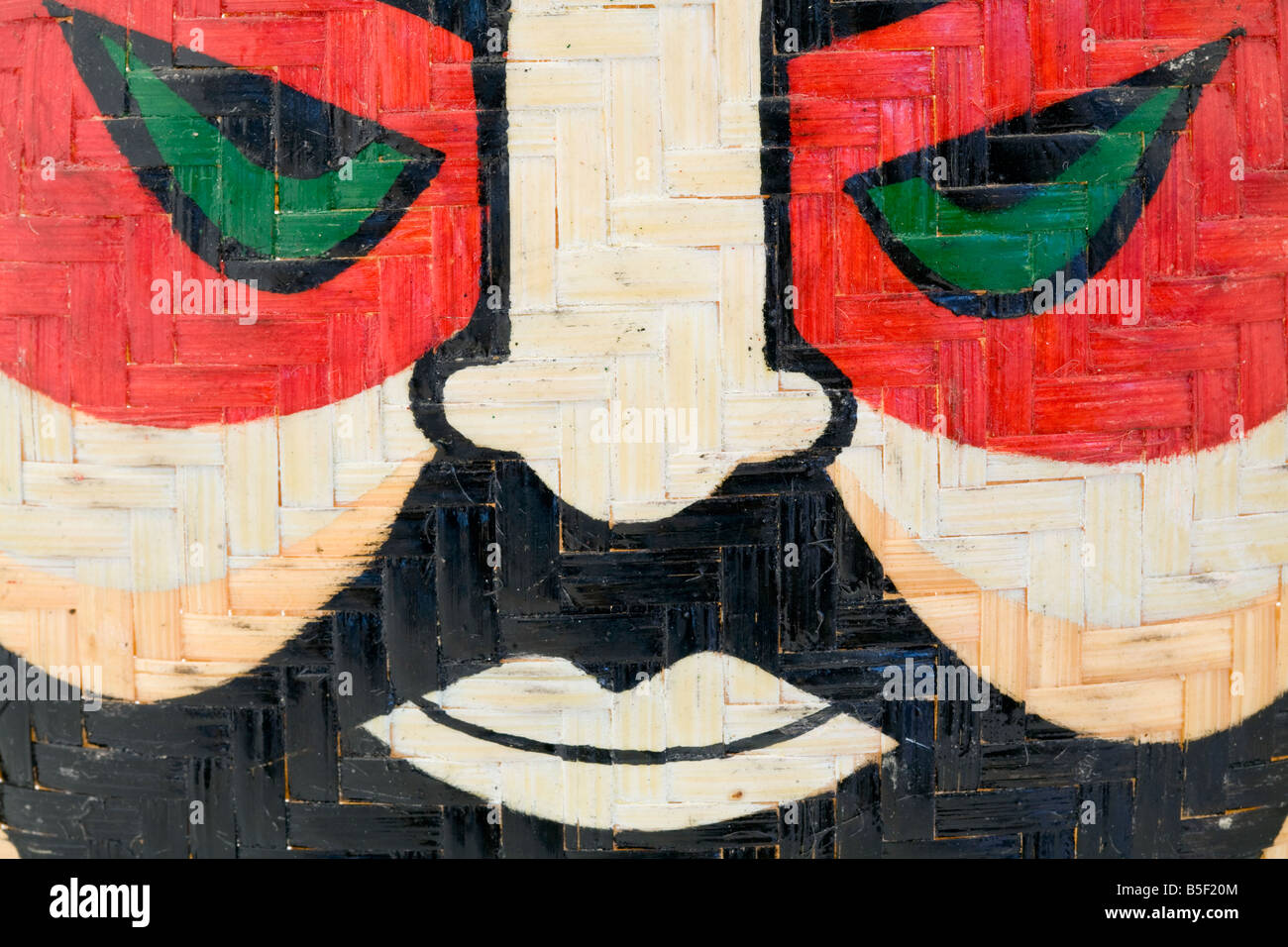 Close up of souvenir wicker mask from Vietnam Stock Photo - Alamy
