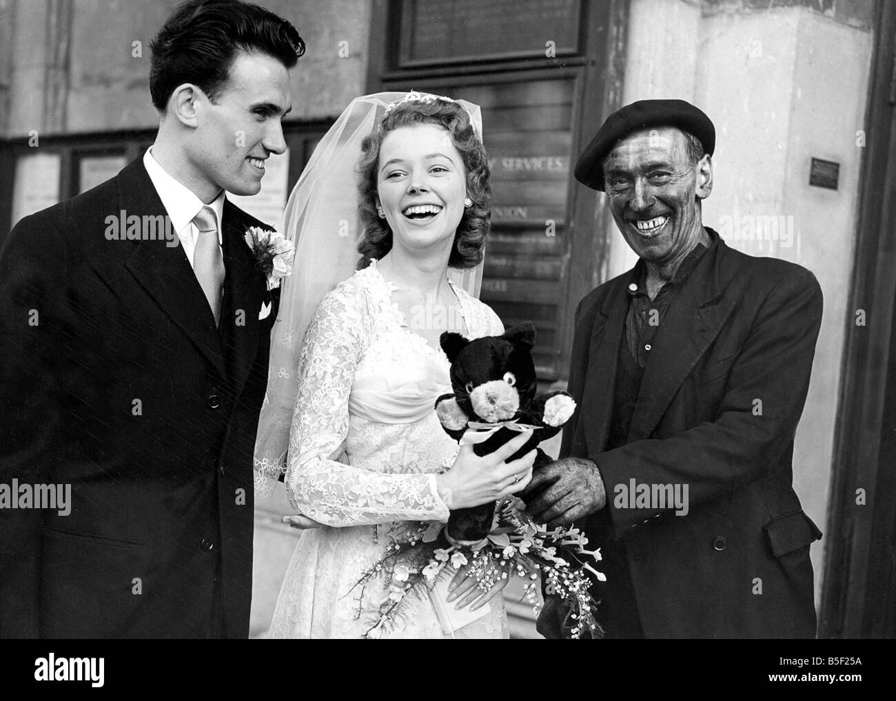 Double luck for the bride Mrs Maureen Saunders as a chimney sweep ...