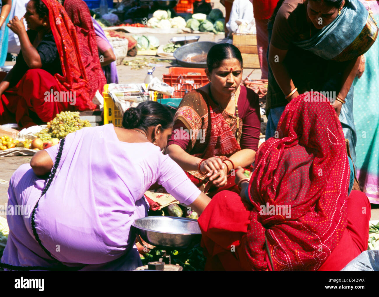 women in sari, fruit market, Diu, India Stock Photo - Alamy