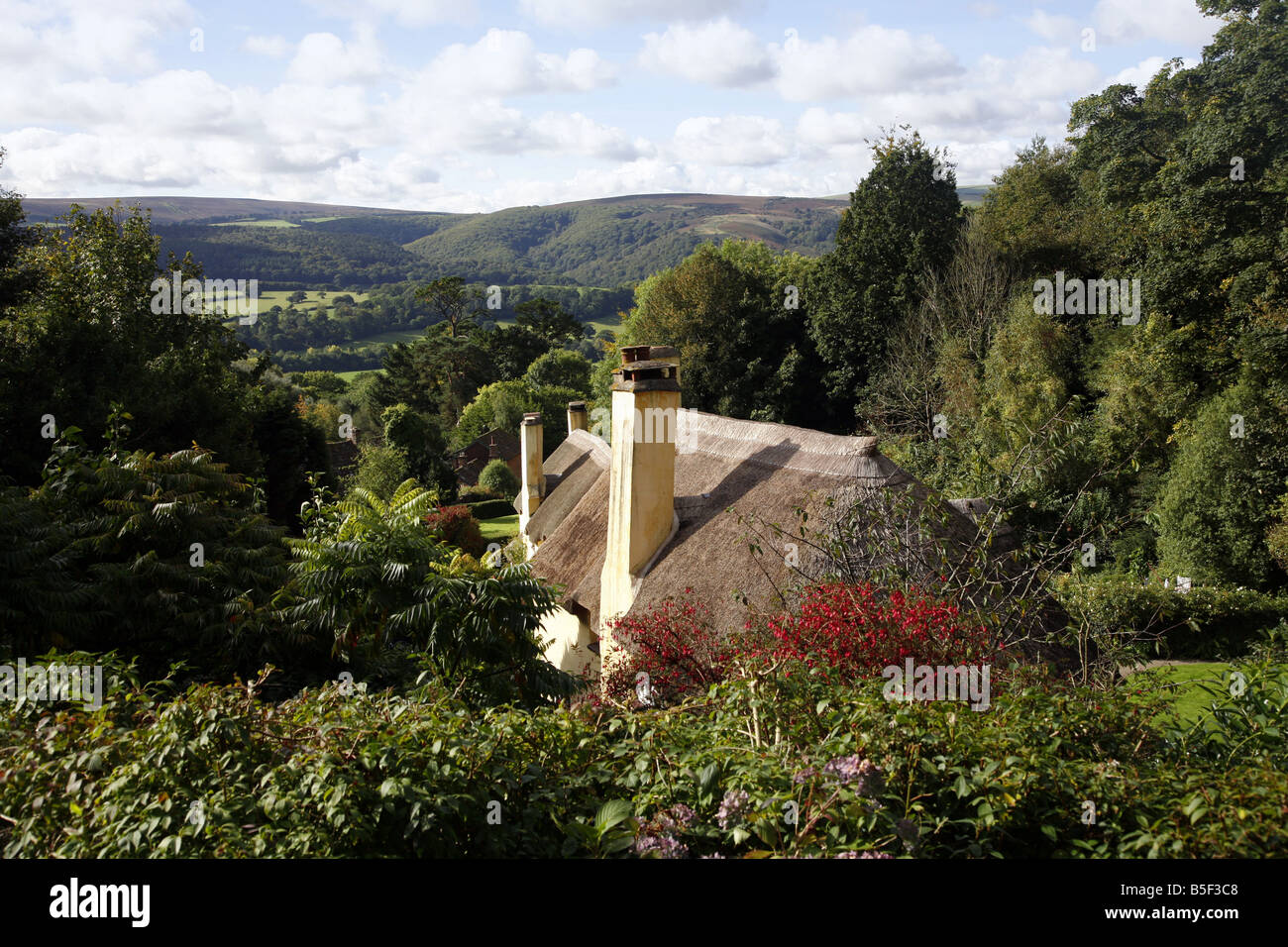 Thatched cottages in the picturesque village of Selworthy, which is ...