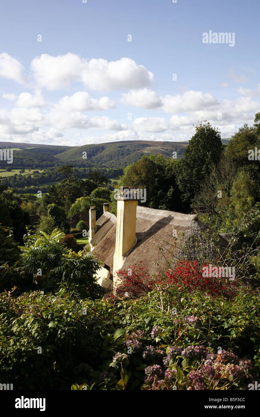 Thatched cottages in the picturesque village of Selworthy, which is ...