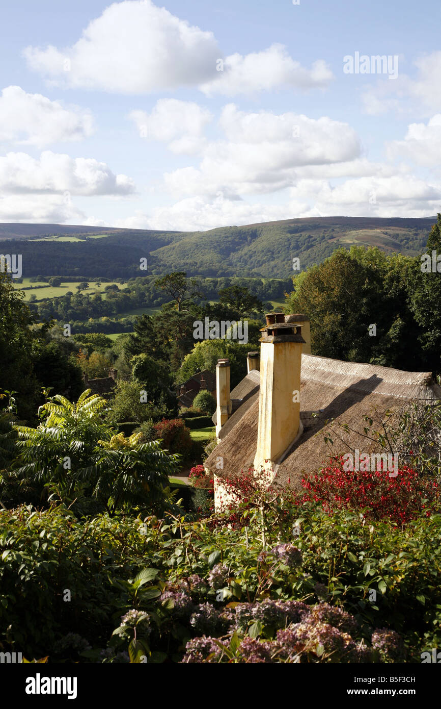 Thatched cottages in the picturesque village of Selworthy, which is ...