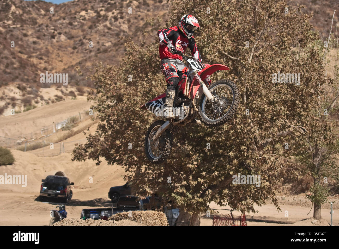 Motorcross rider airborne over jump at Glen Helen circuit Devore ...