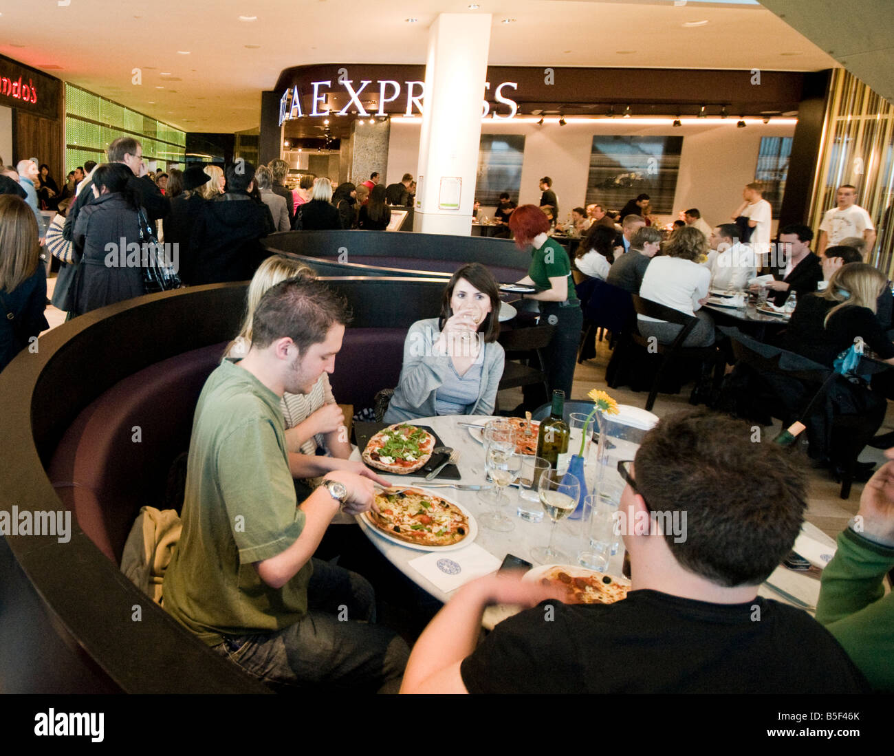 People eating at Pizza Express in London Stock Photo - Alamy