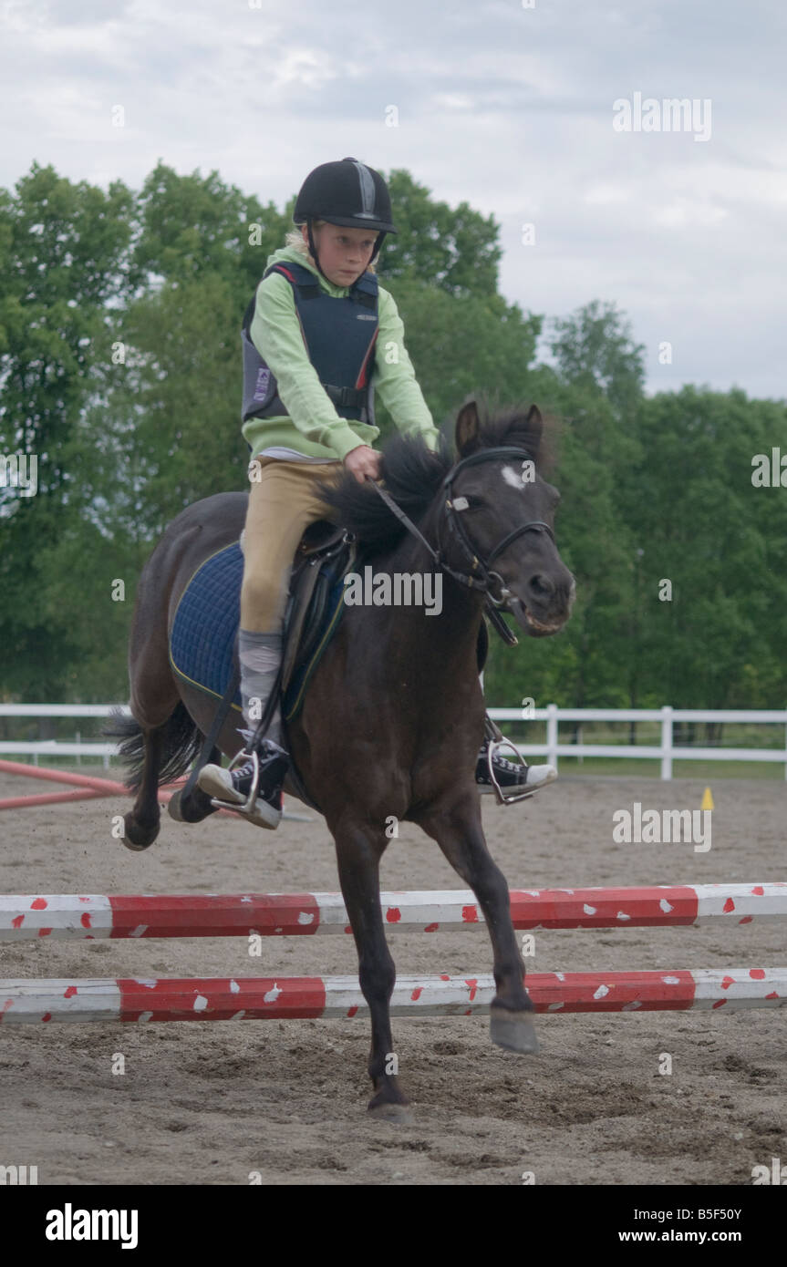 Child jump horse hi-res stock photography and images - Alamy