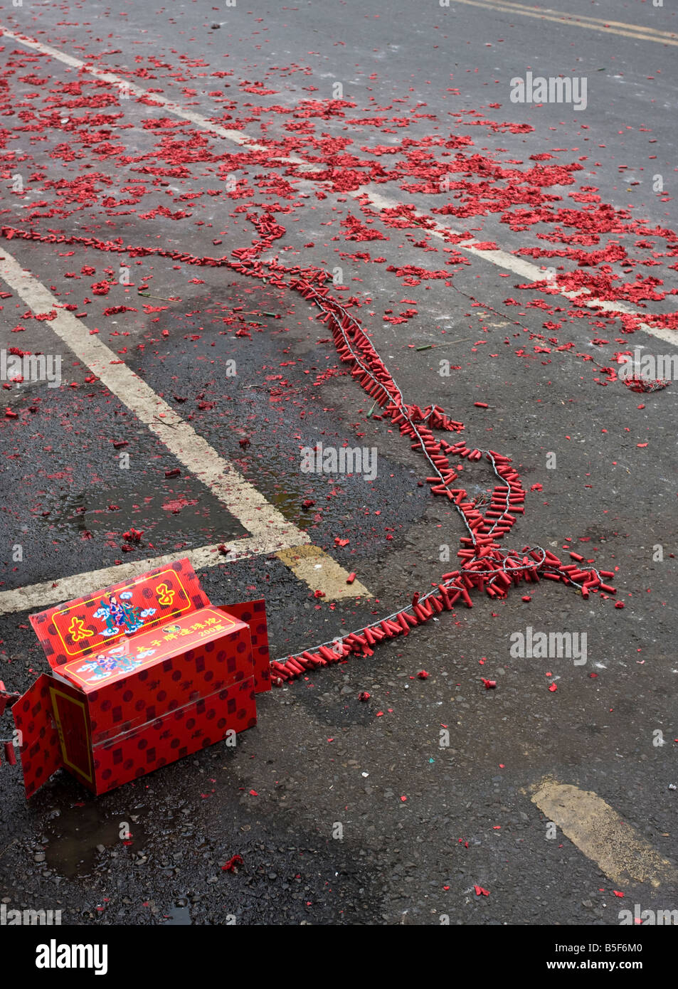 Red firecrackers line the road at the Mazu, Goddess of the Sea ...