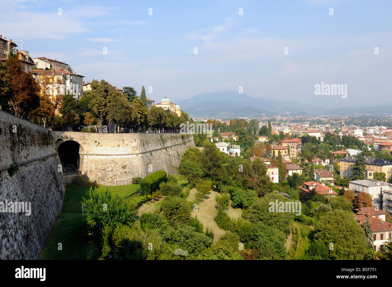 View of the fortified old town of Bergamo, surrounded by its city walls ...
