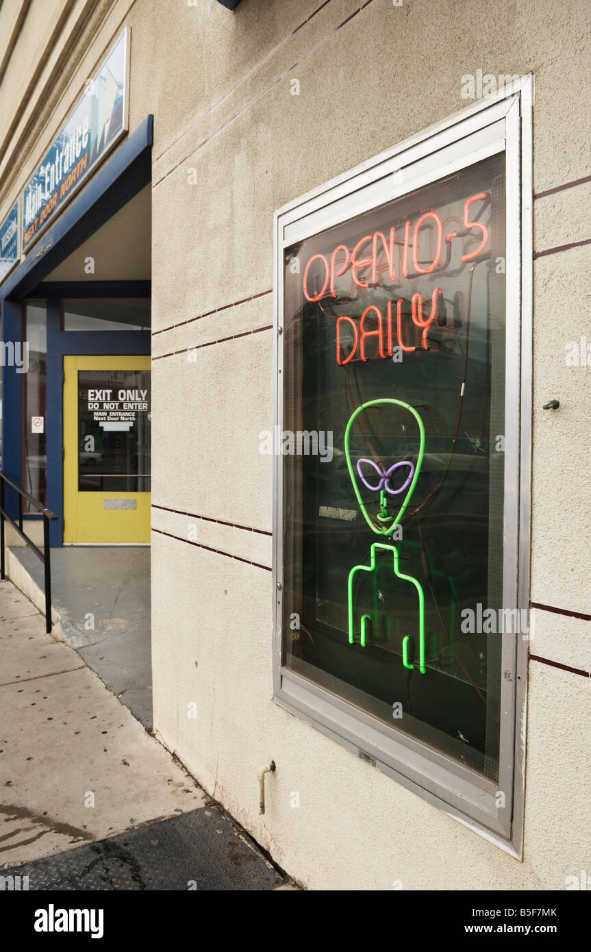 Neon alien in a frame Stock Photo - Alamy
