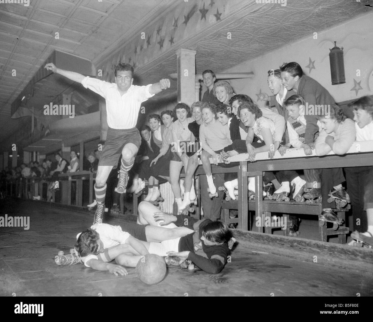 Roller Skate football May 1956 Stock Photo - Alamy