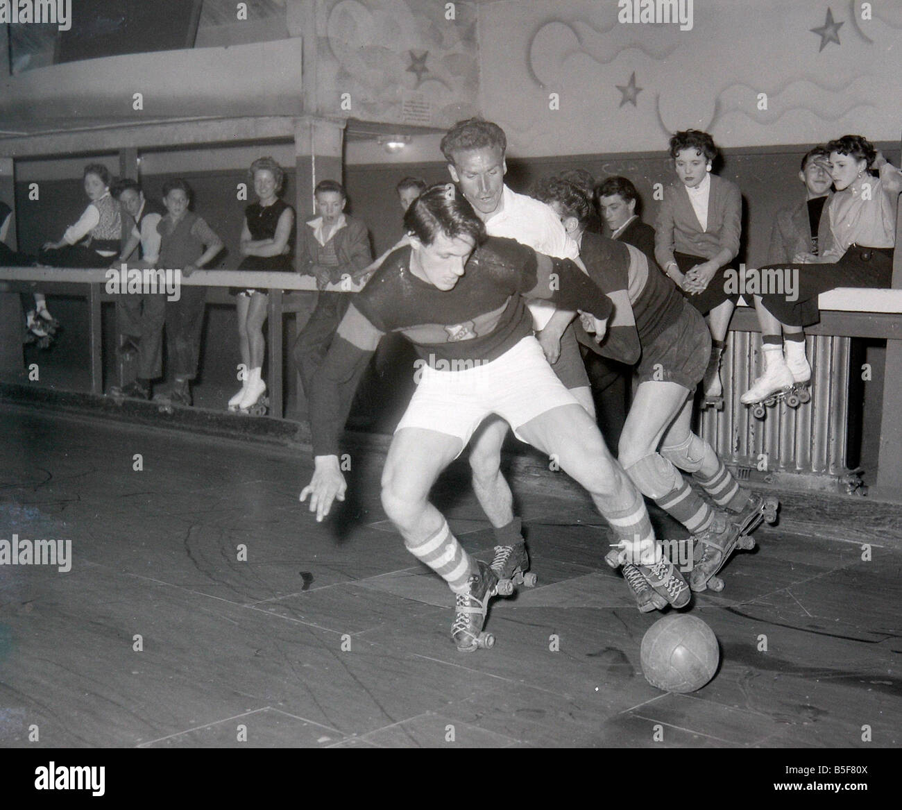 Roller Skate football May 1956 Stock Photo - Alamy