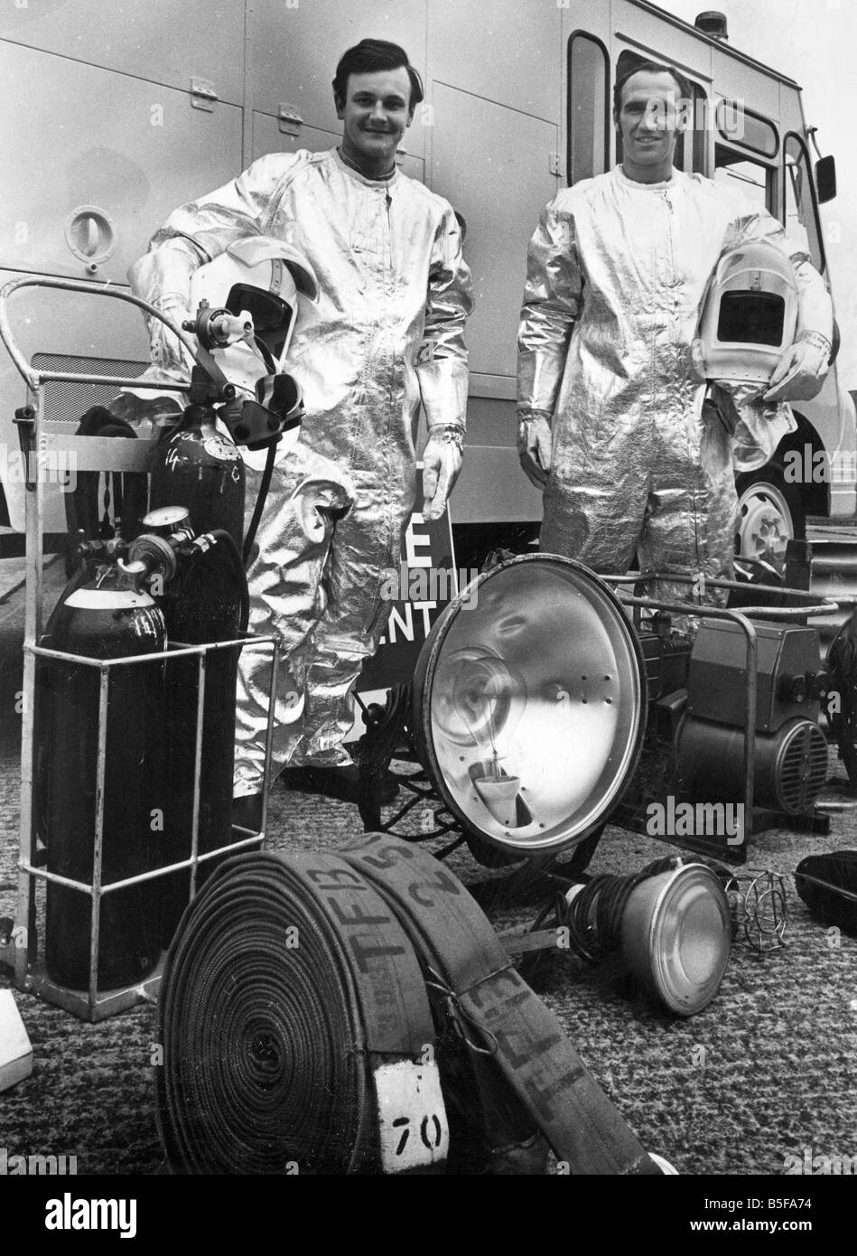 Firefighters David Edwards left and Ken Bailey dressed in heat proof ...