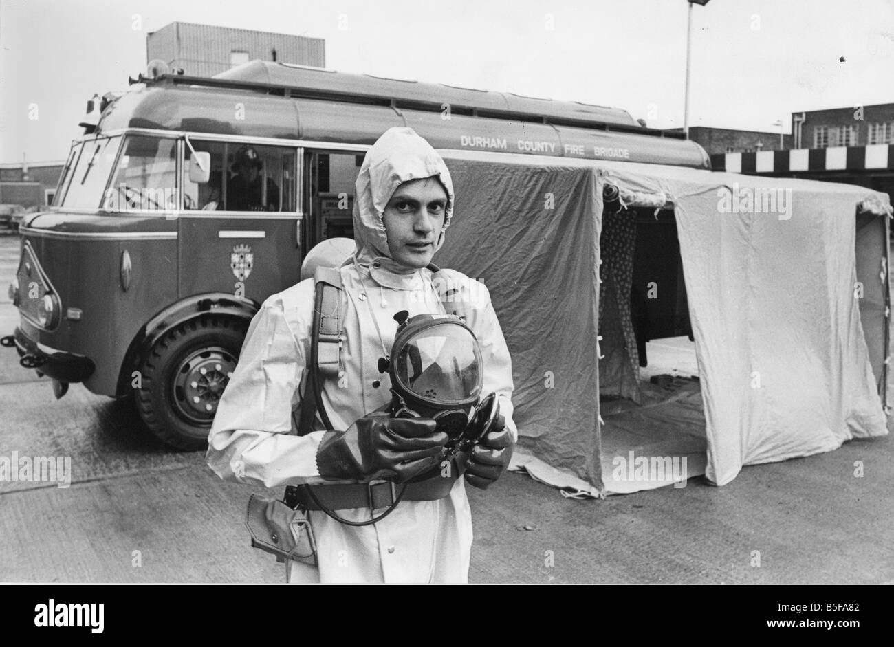 Firefighter Alan Wilson with the complex machinery to combat anything ...