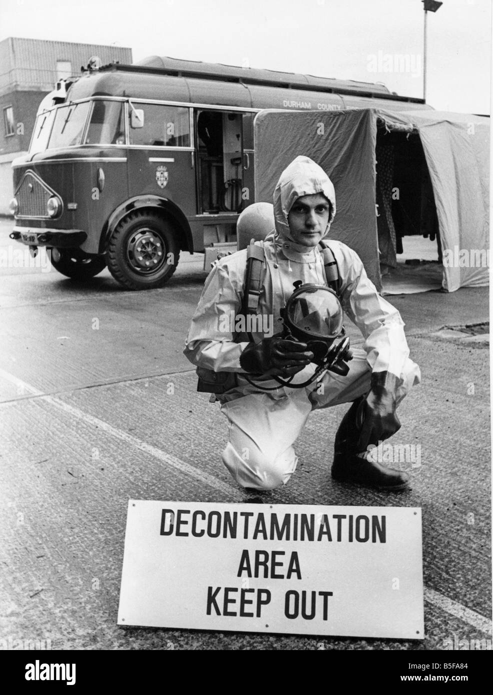 Firefighter Alan Wilson with the complex machinery to combat anything ...