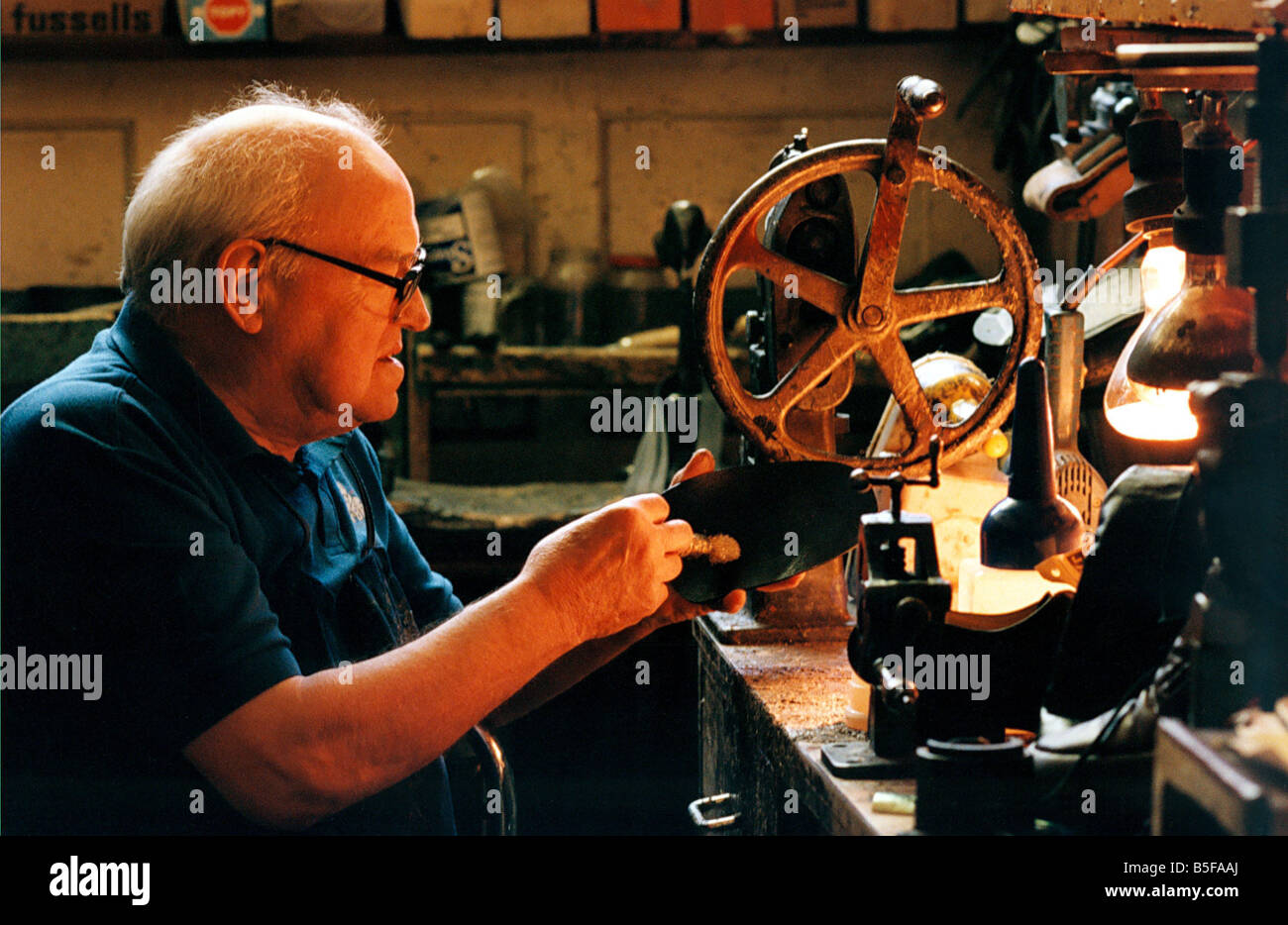 Edwin macklow generation cobbler work hi-res stock photography and ...