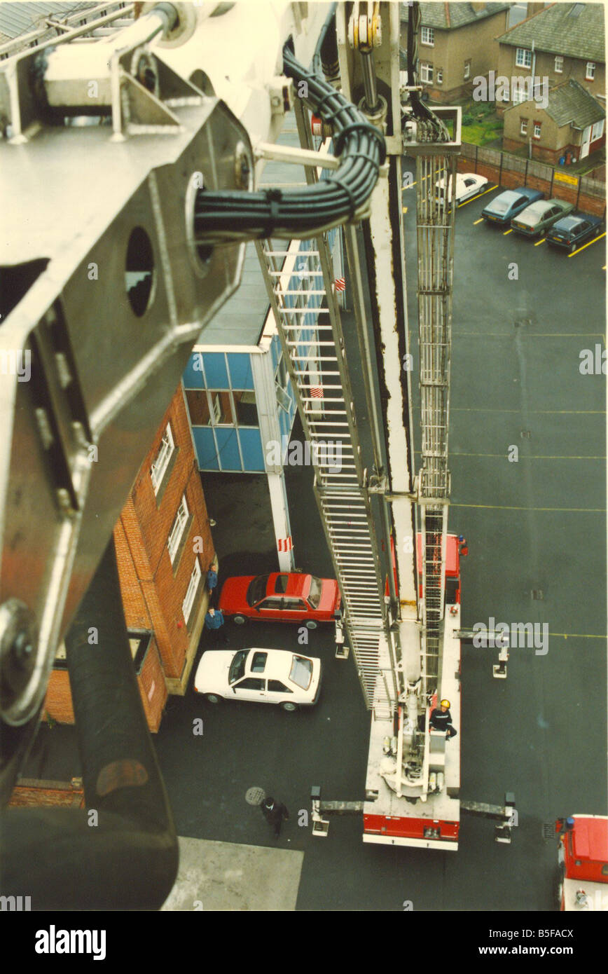 Firefighters practice rescue routines using one of their turntable ...