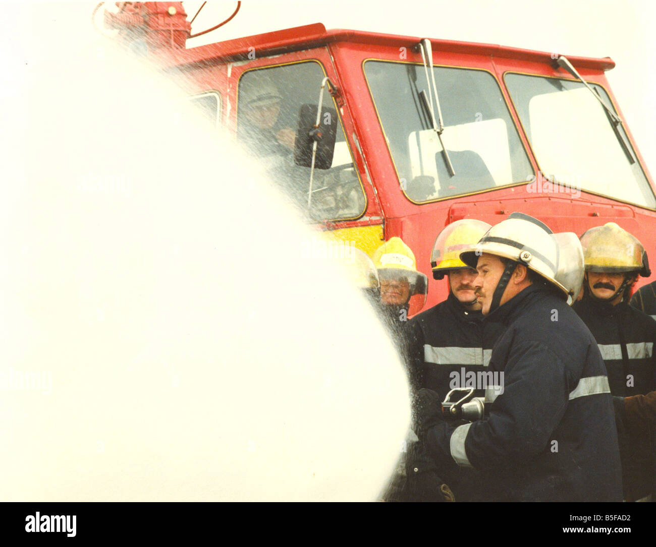 Firefighters practice rescue routines in a training exercise on the ...