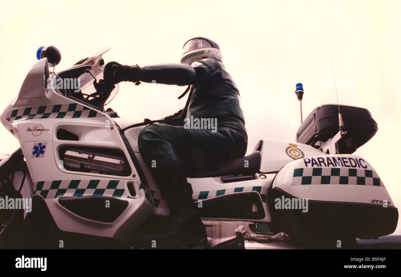 A paramedic on a motorcycle ready for the next call Stock Photo - Alamy