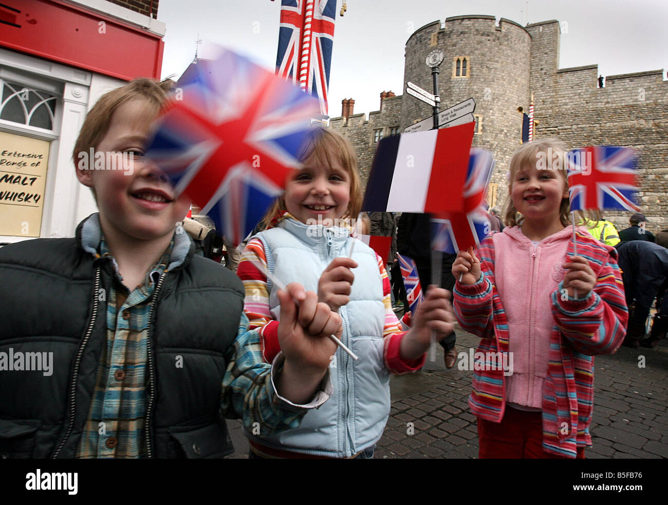 Children waving flags for the state visit of President of France ...