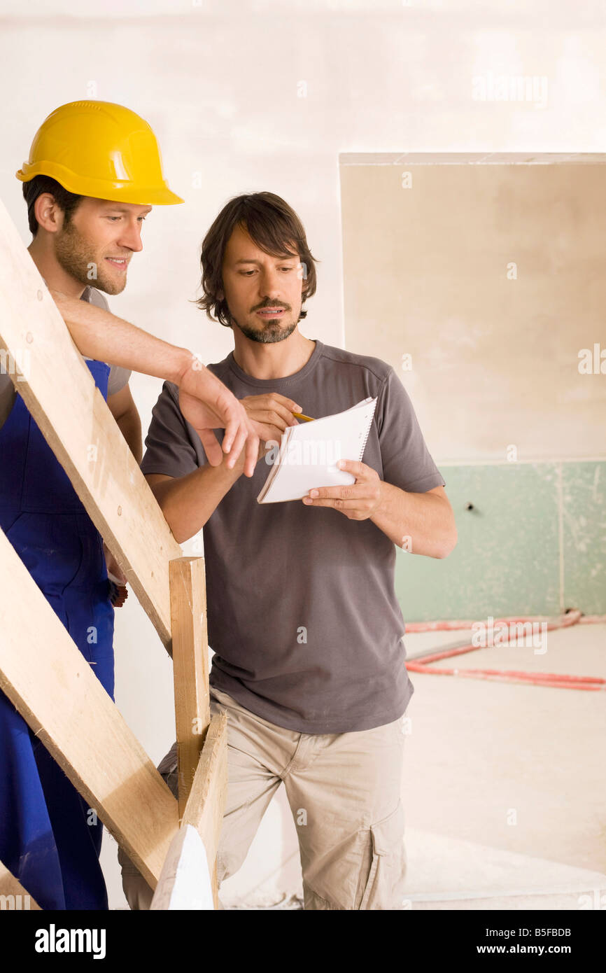 Construction workers communicate communication hi-res stock photography ...