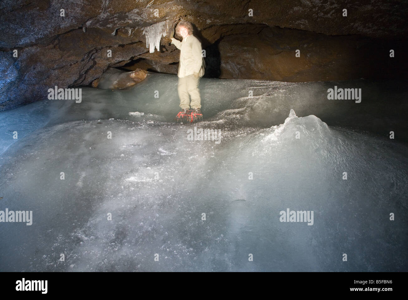Woman standing inside the Grotta del Gelo, Etna volcano Stock Photo - Alamy