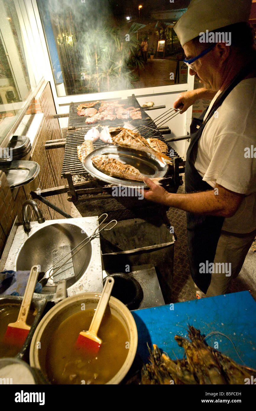 Grilling fish in alvor algarve portugal hi-res stock photography and ...