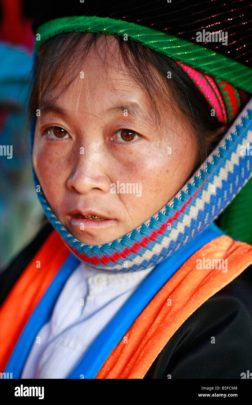 White Hmong tribeswoman at the market at Dong Van, Ha Giang Province ...