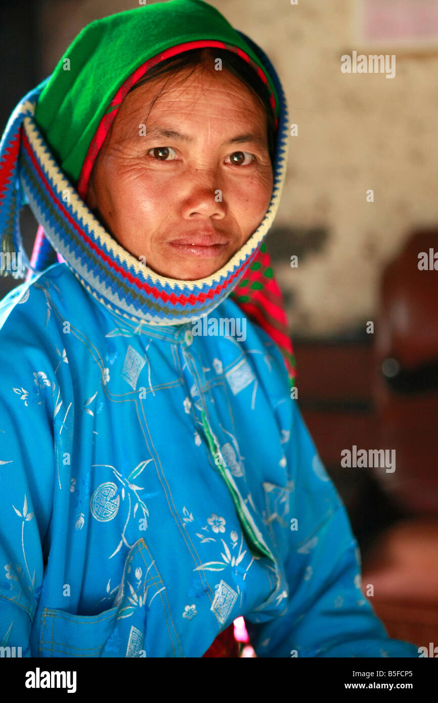 White Hmong tribeswoman at the market at Dong Van, Ha Giang Province ...