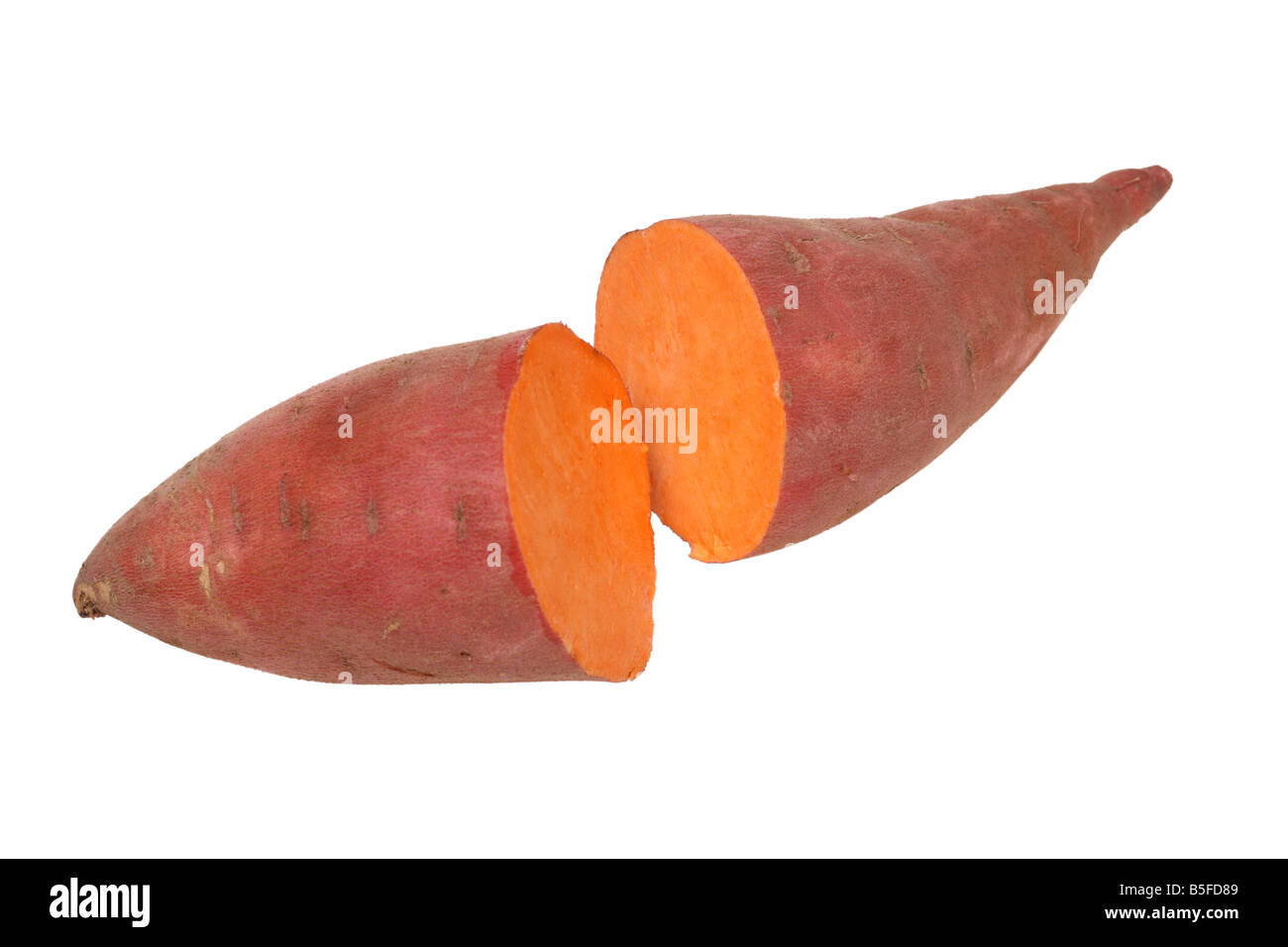 Yam cut in half cutout on white background Stock Photo - Alamy
