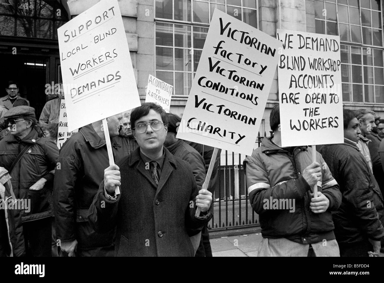 Demostrations. Blind Workers demonstrate against the R.S.B. Banners say ...