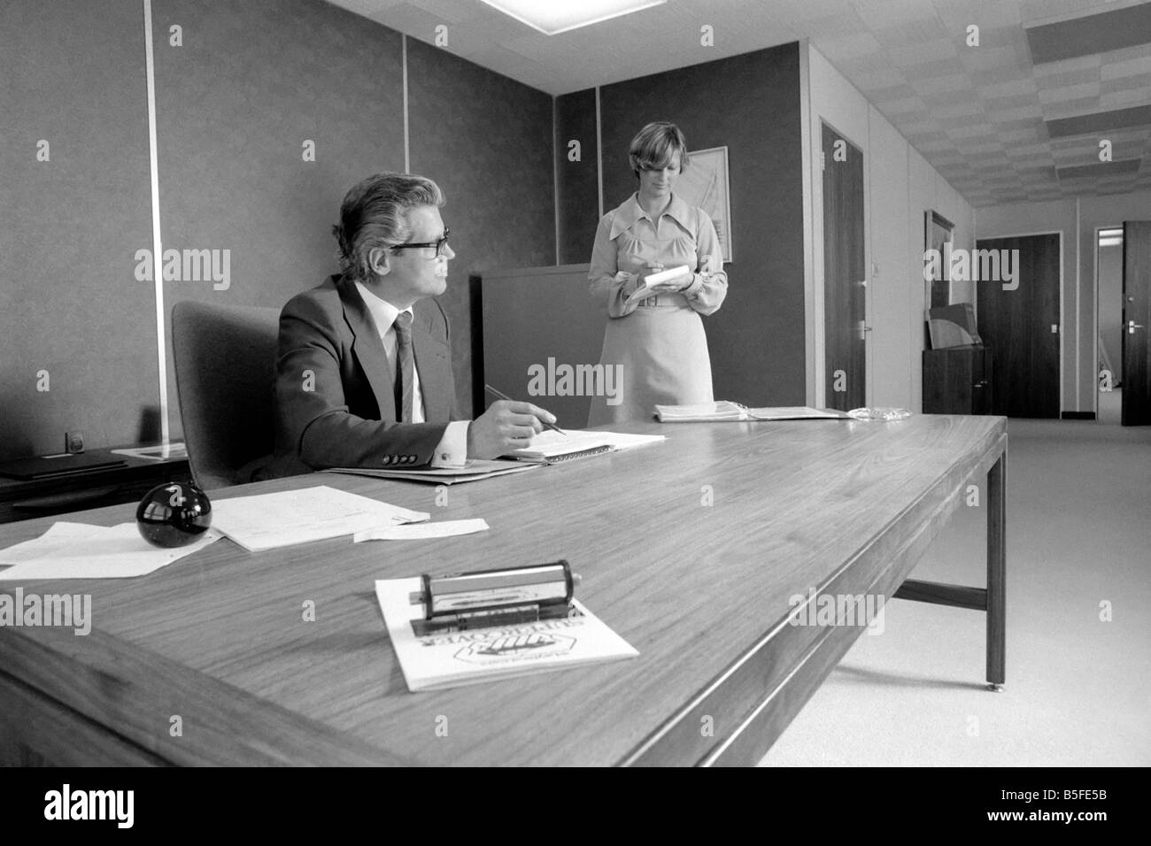 Boss secretary 1970s hi-res stock photography and images - Alamy