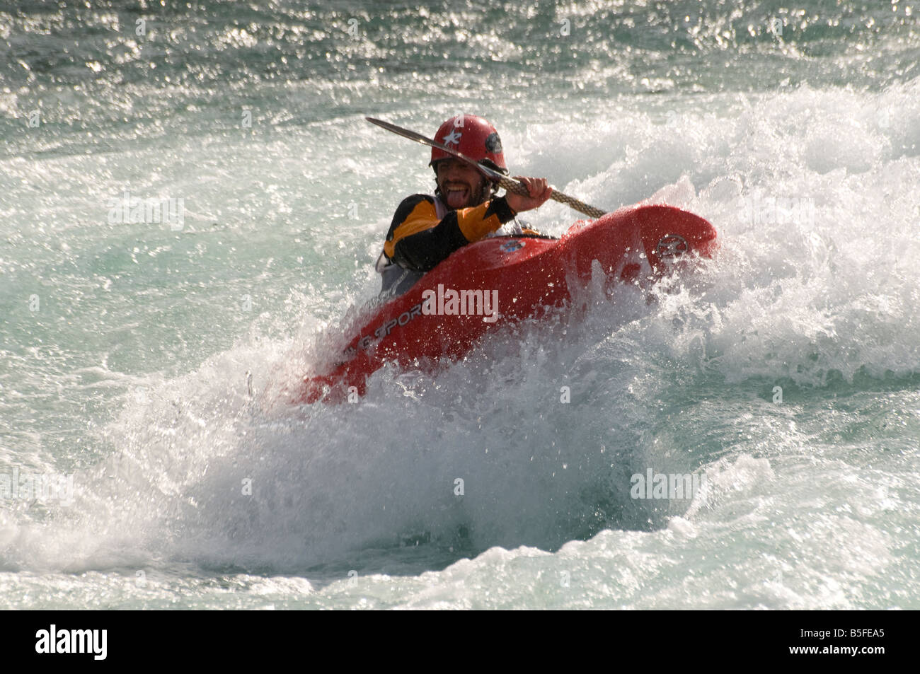Competitor in whitewater kayaking competition Stock Photo - Alamy