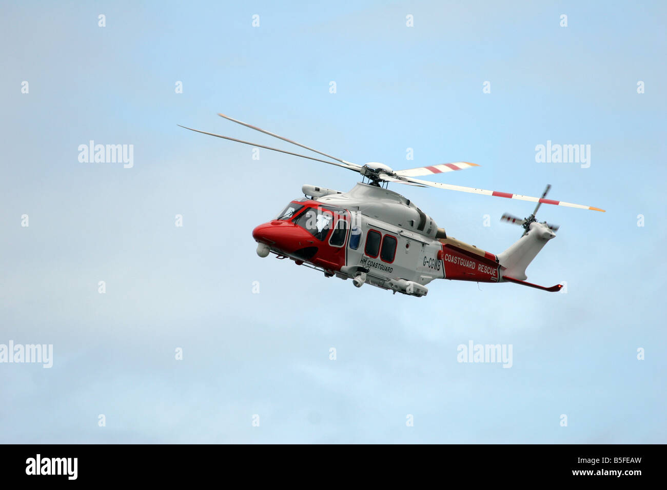 air sea rescue helicopter over dorset coast Stock Photo - Alamy