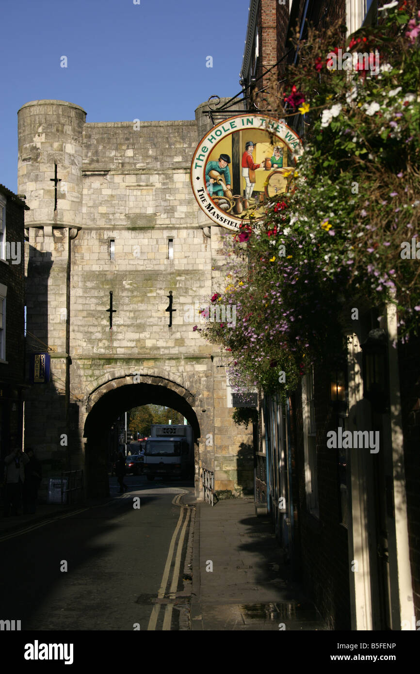 City of York, England. Retail shops in High Petergate, with Bootham Bar ...