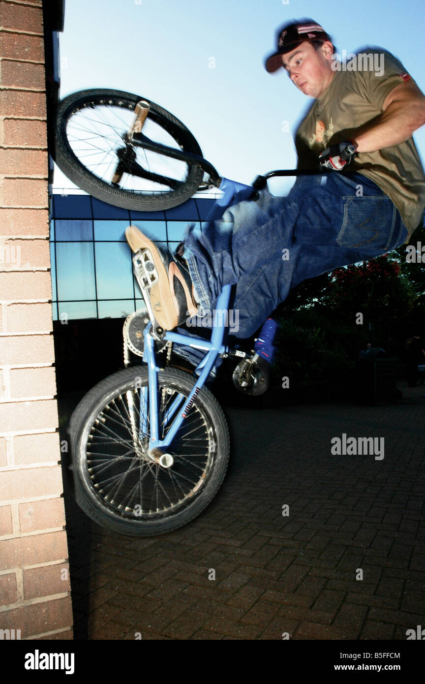 Bike on the wall Stock Photo - Alamy