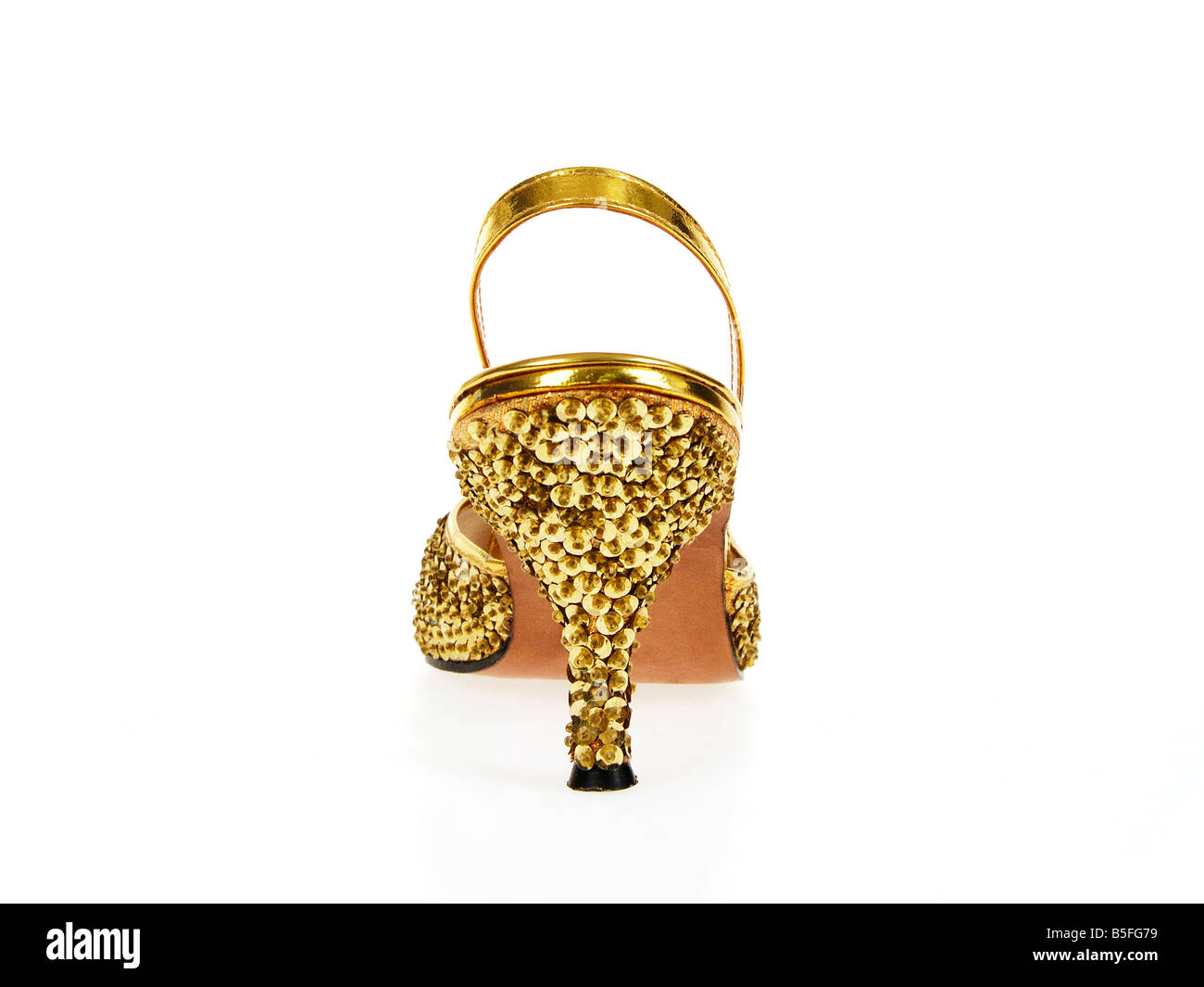 golden high heal shoe Stock Photo - Alamy