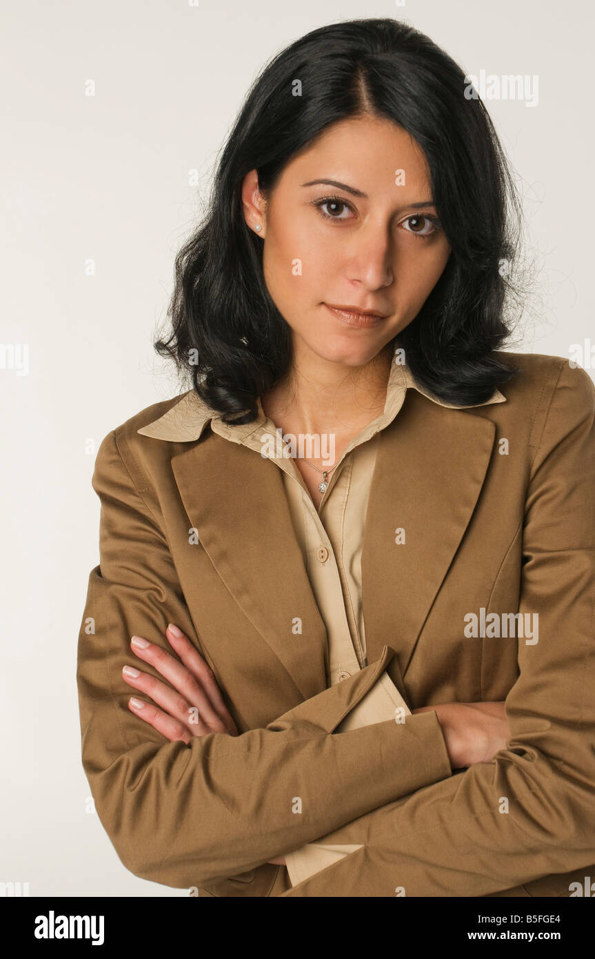 Young woman, arms folded, portrait Stock Photo - Alamy