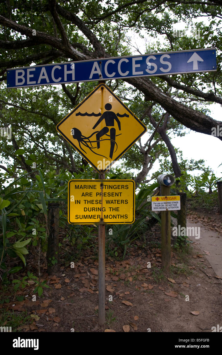 A warning sign to alert visitors to the presence of marine stingers in ...