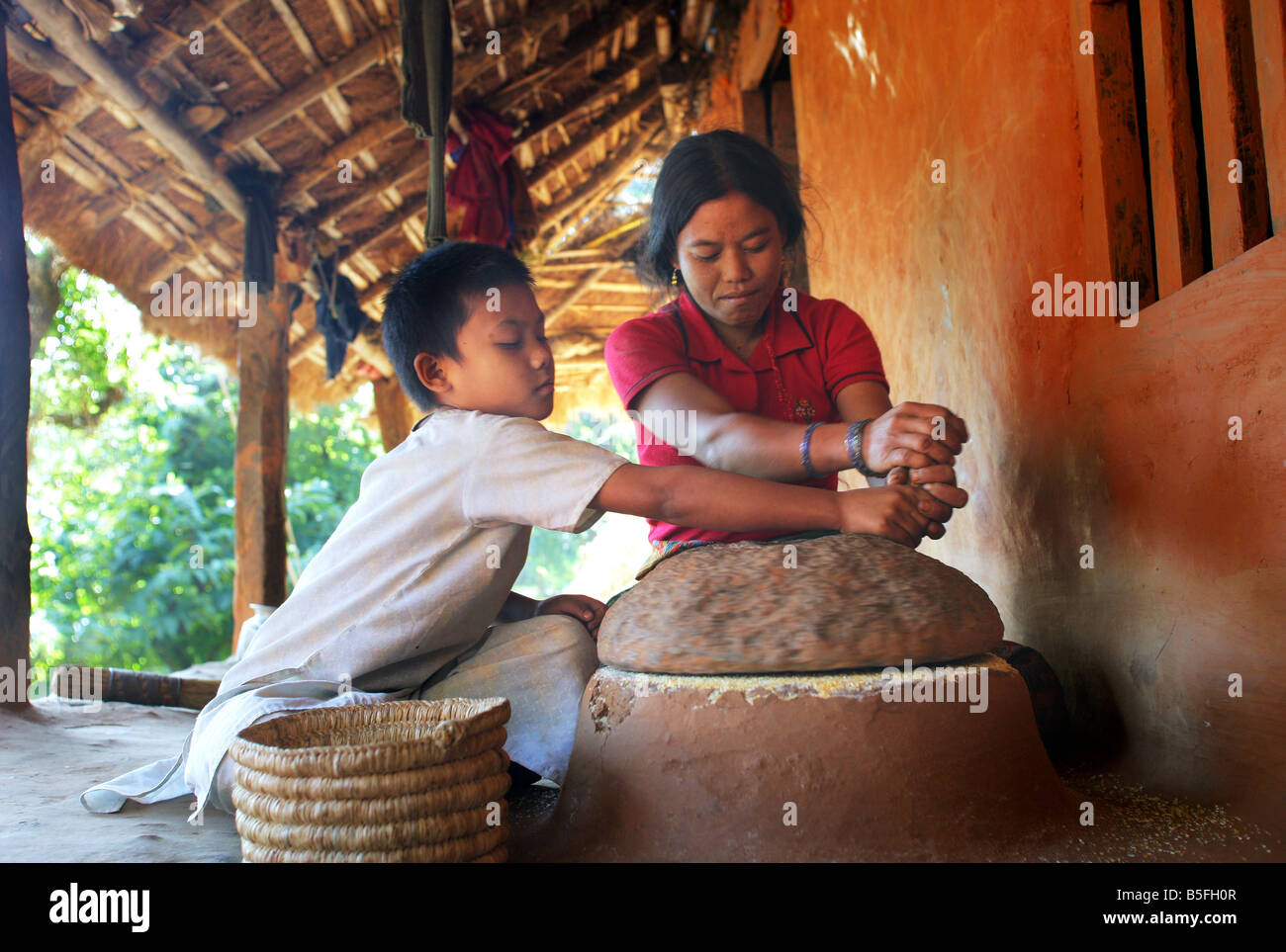 Stone grain grinder High Resolution Stock Photography and Images - Alamy
