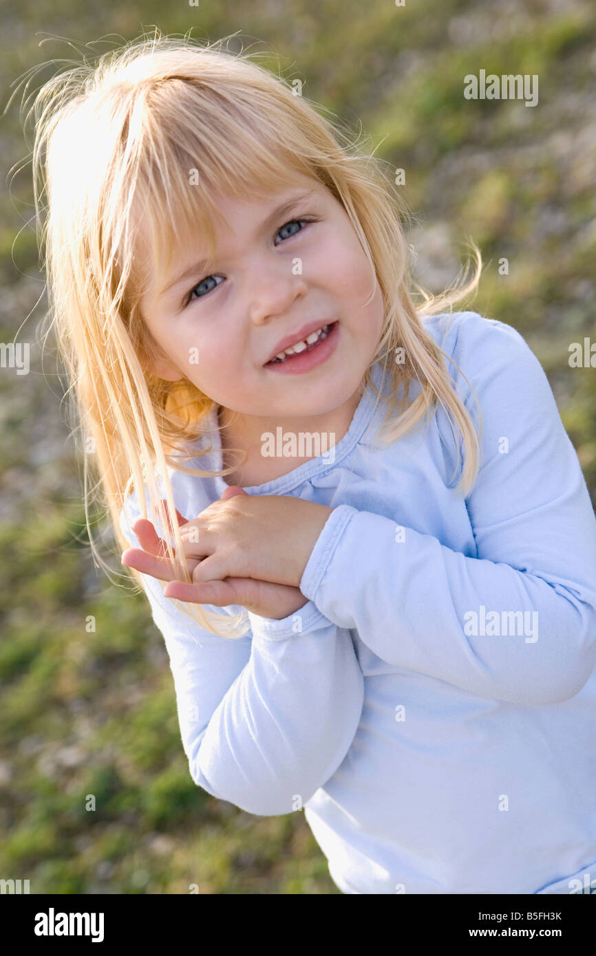 Little girl (3-4), looking hopeful, portrait Stock Photo - Alamy
