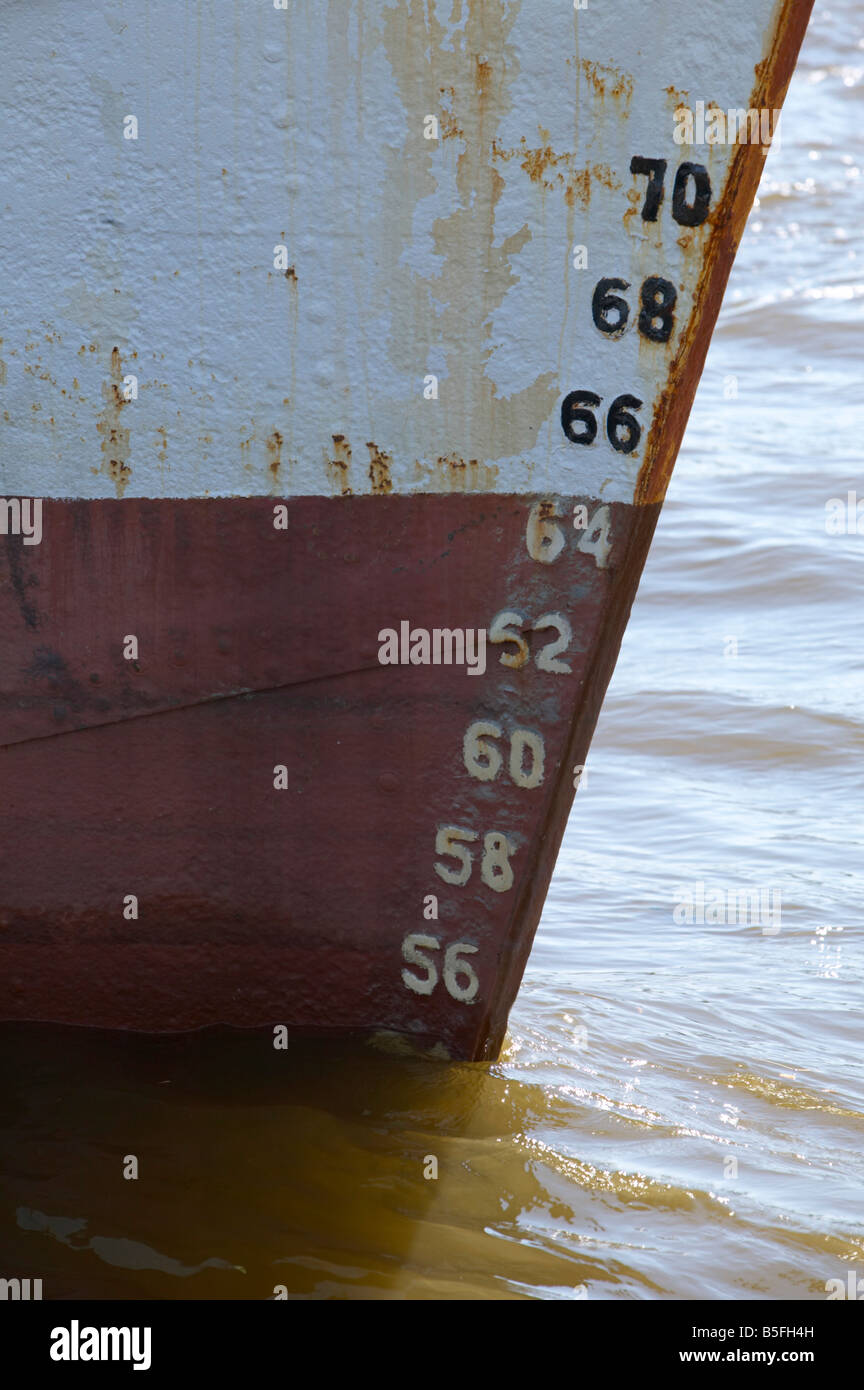 Germany, Hamburg, Container ship, Rusted hull, draft scale at the bow ...
