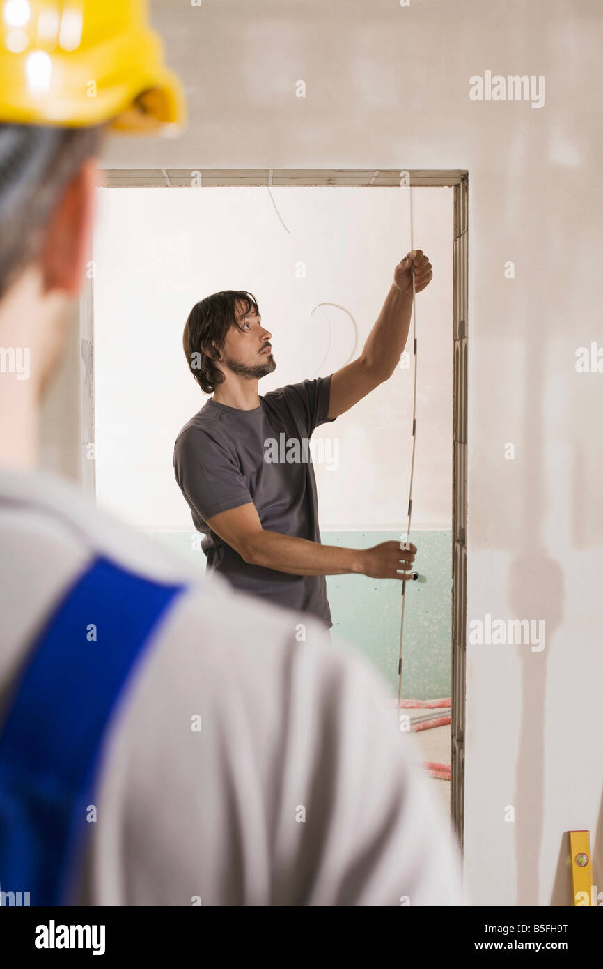New building door measuring hi-res stock photography and images - Alamy