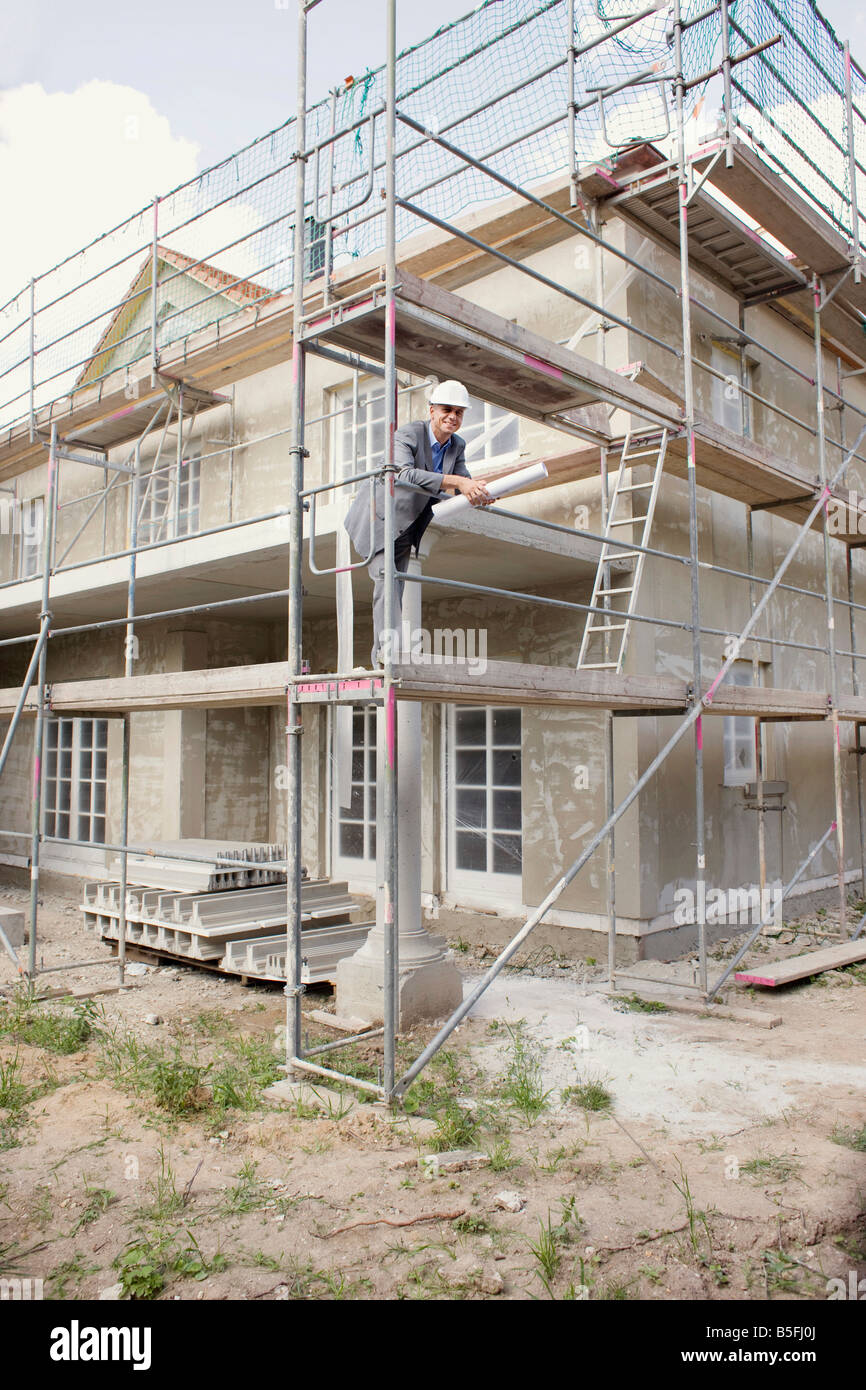 Architect on construction site Stock Photo - Alamy