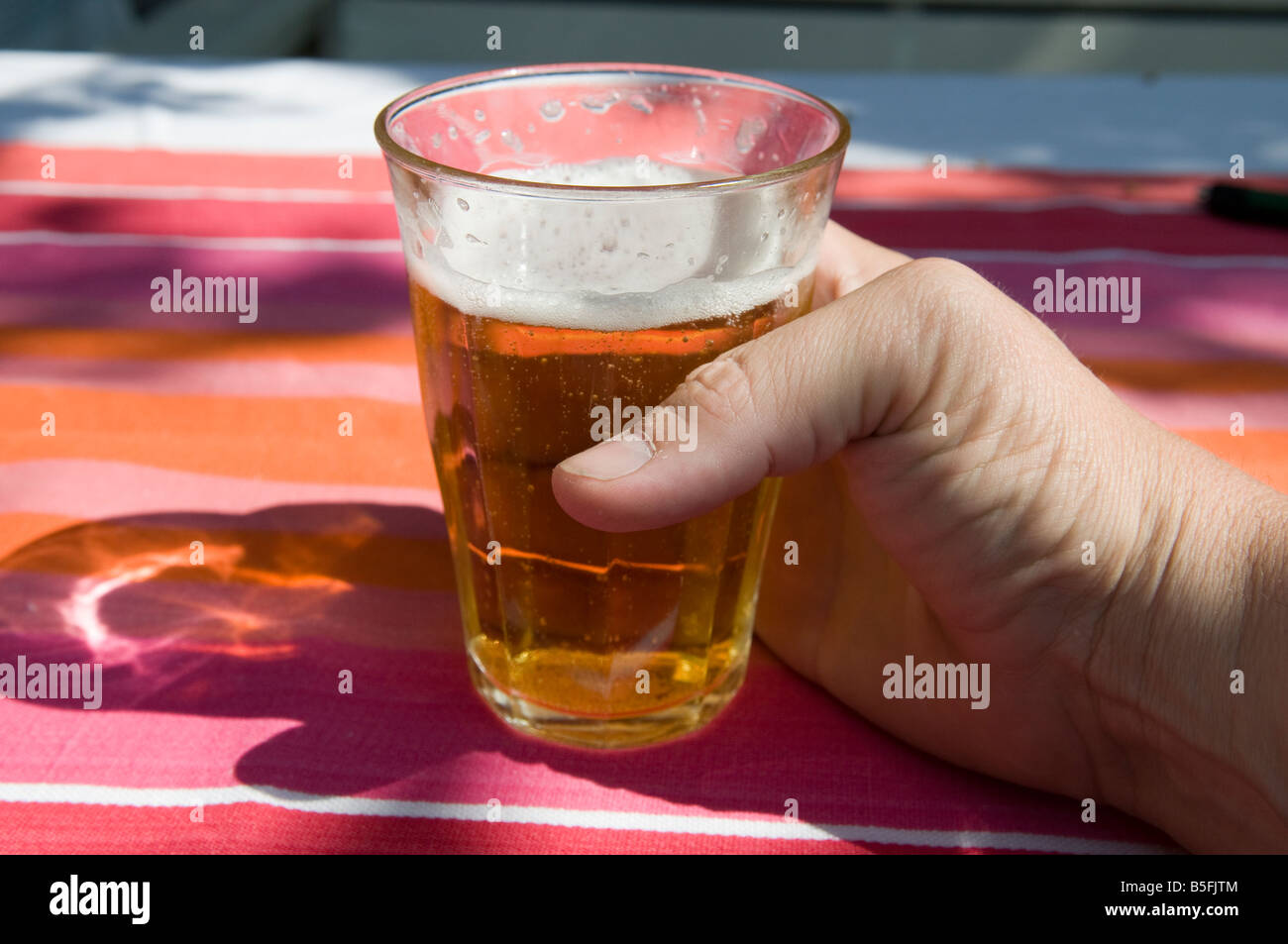 A glass of beer in the sun Stock Photo - Alamy
