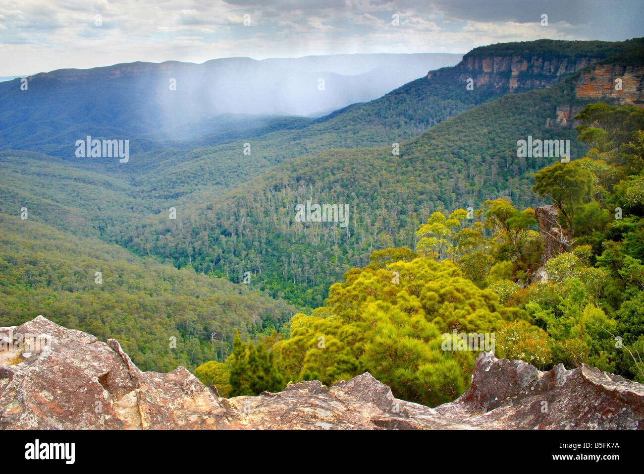 Rain is coming from the valley Stock Photo - Alamy
